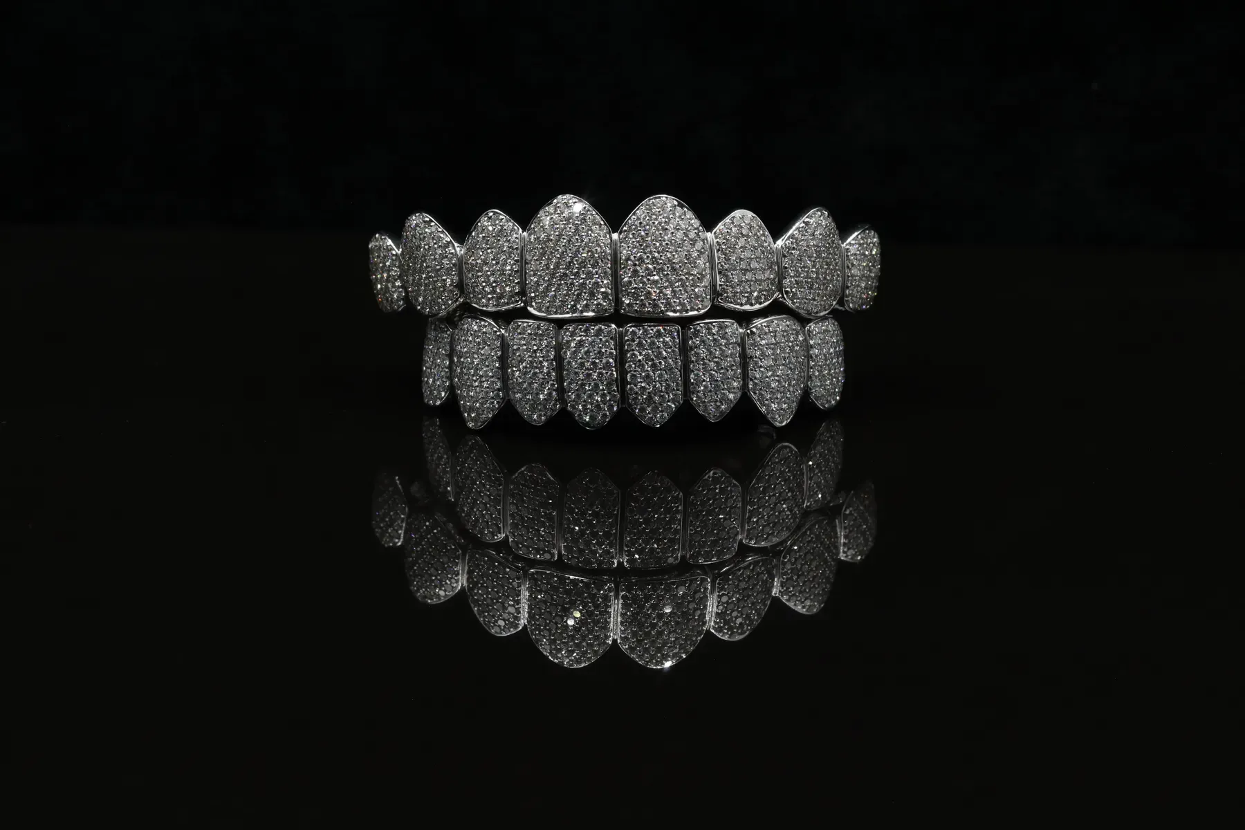 Diamond-Encrusted Grillz Buying Guide: Types, Costs, and Designs